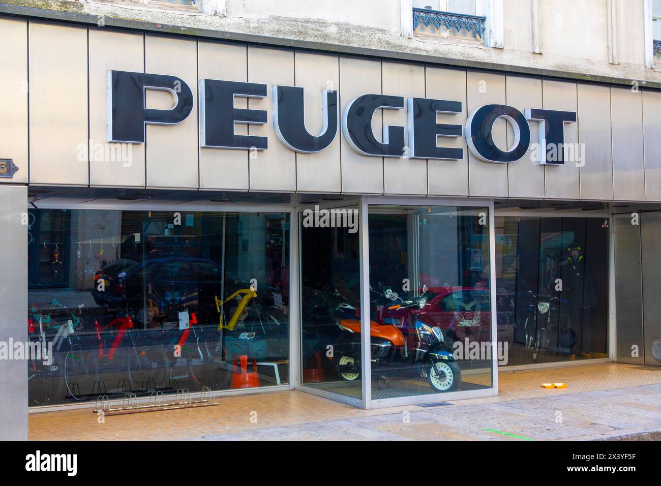 Peugeot two-wheeler sign Stock Photo - Alamy