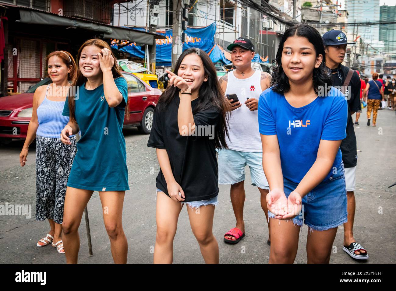 Filipino children play street games together during an annual religious ...