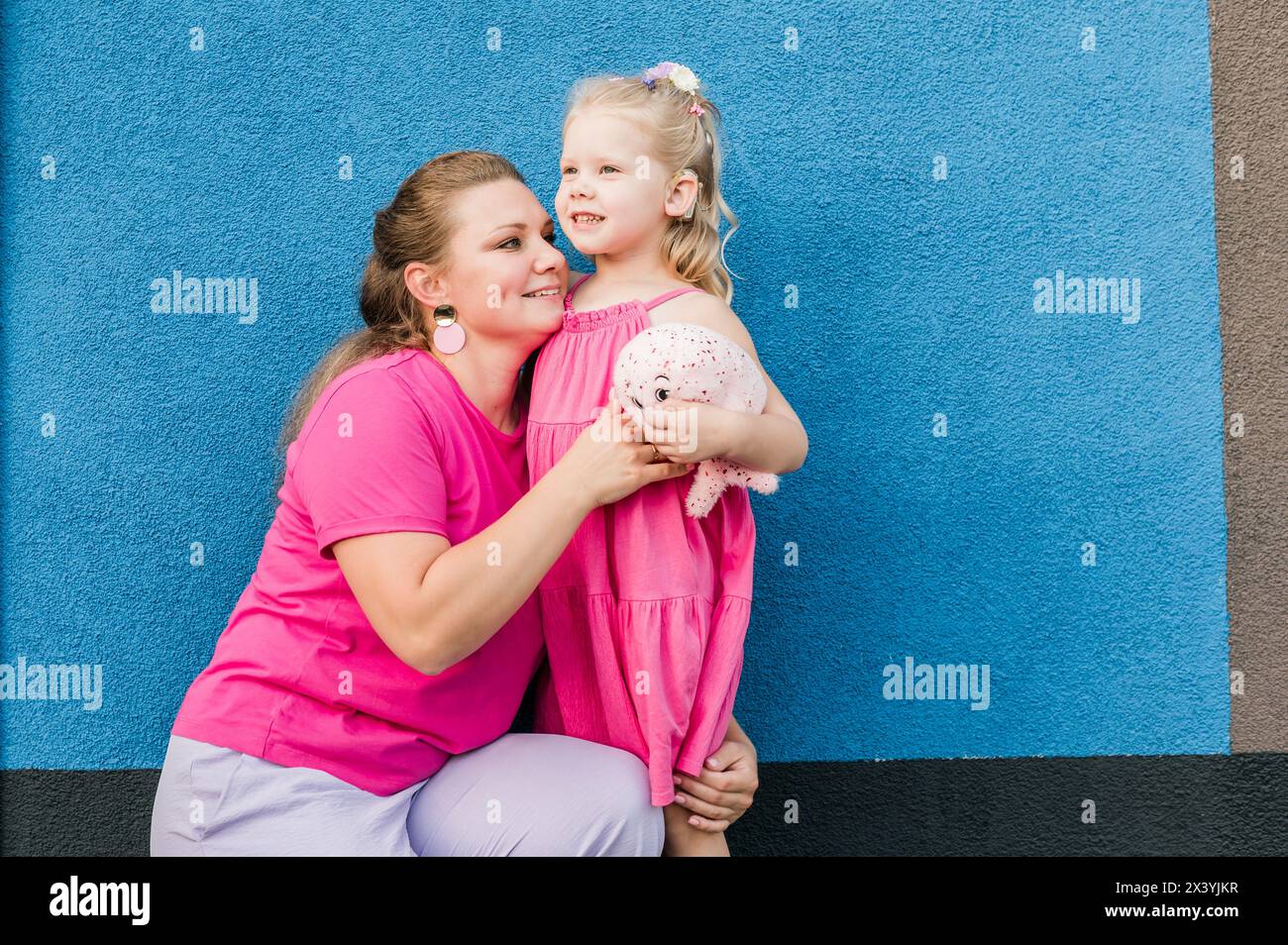 Deaf child with cochlear implant for hearing audio and aid for ...