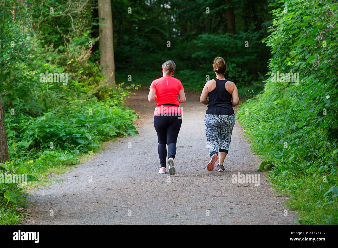 Two women from back hi-res stock photography and images - Alamy