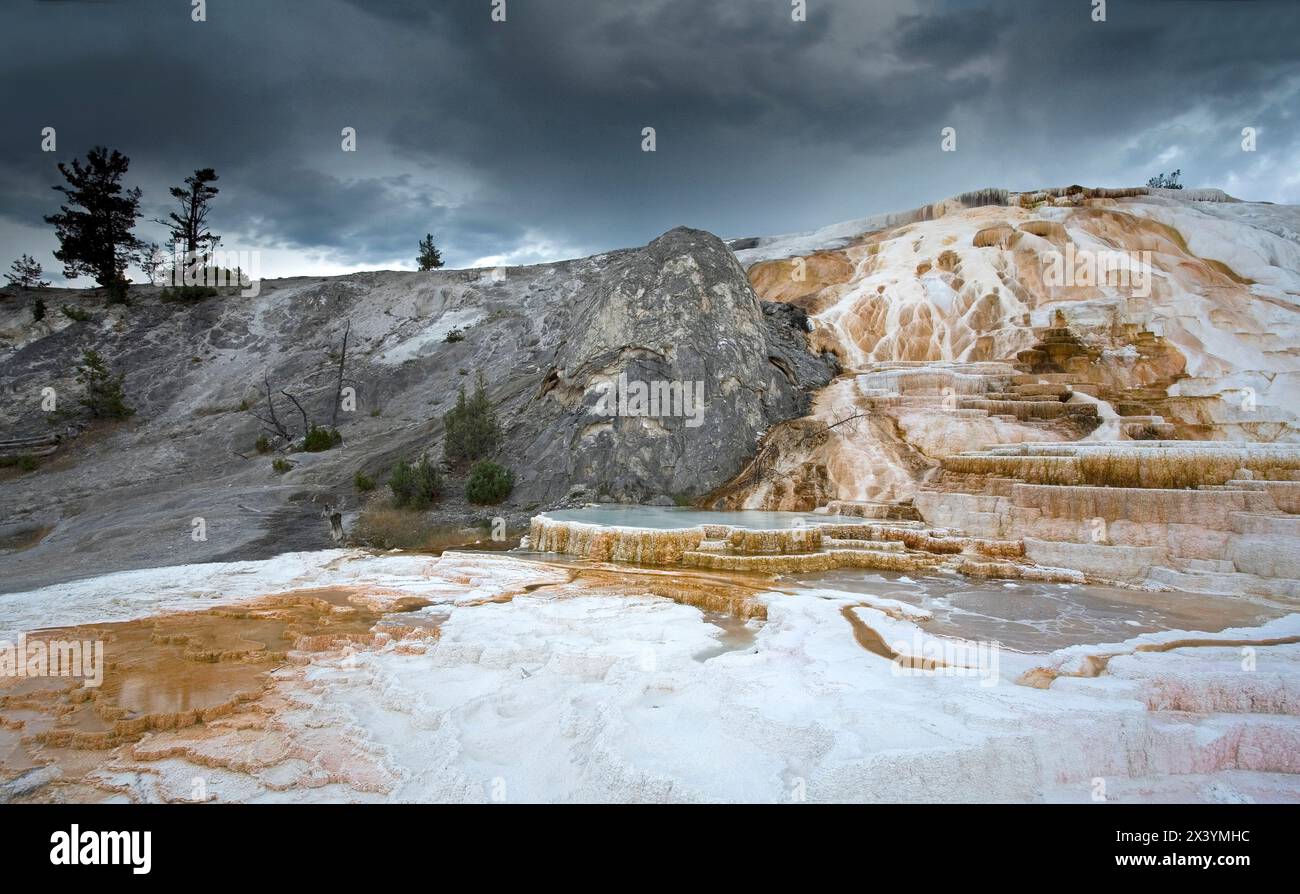 Storm cloud over mammoth hot springs in yellowstone park hi-res stock ...