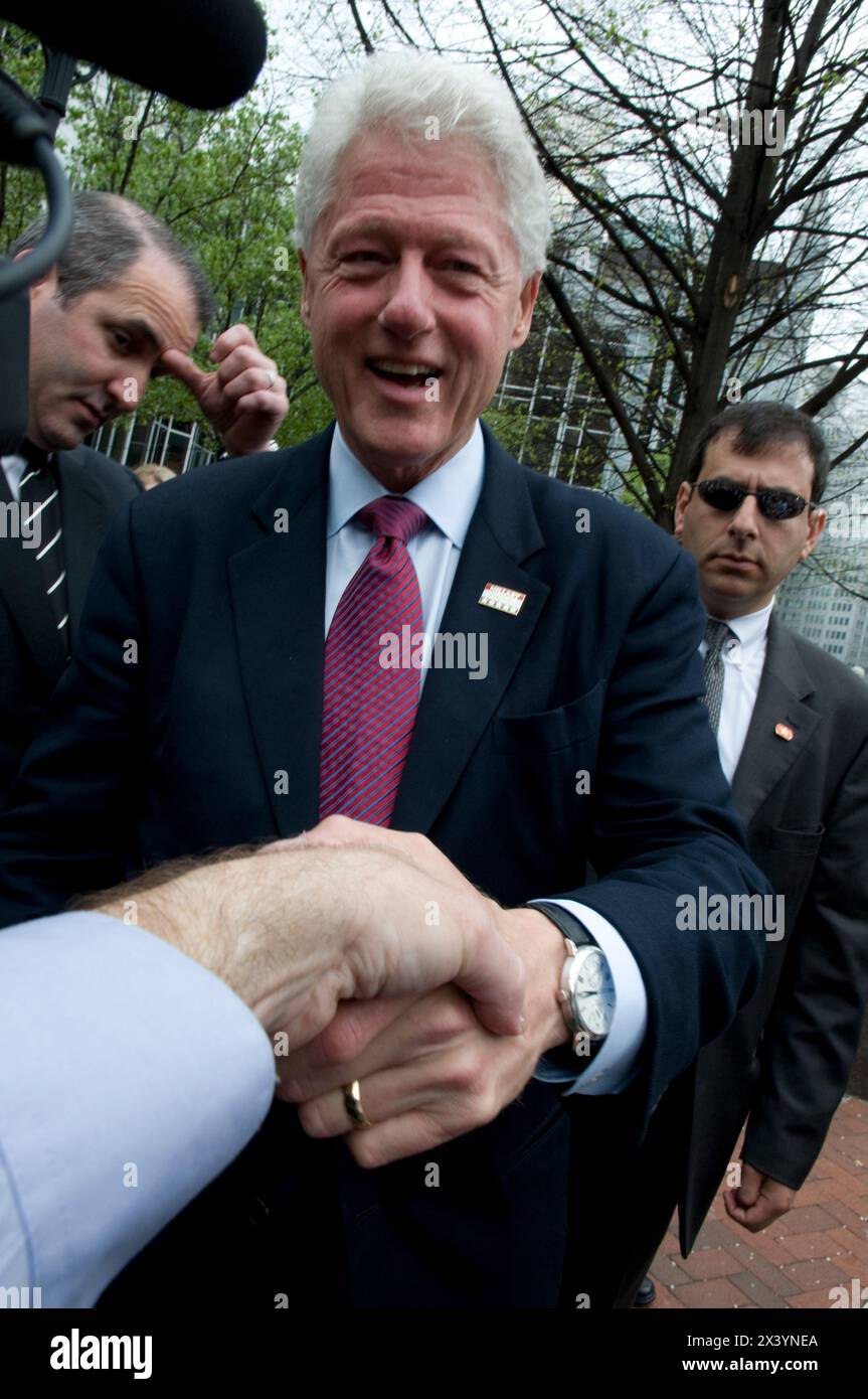Bill Clinton shakes hands with onlookers in Pittsburgh, Pennsylvania ...