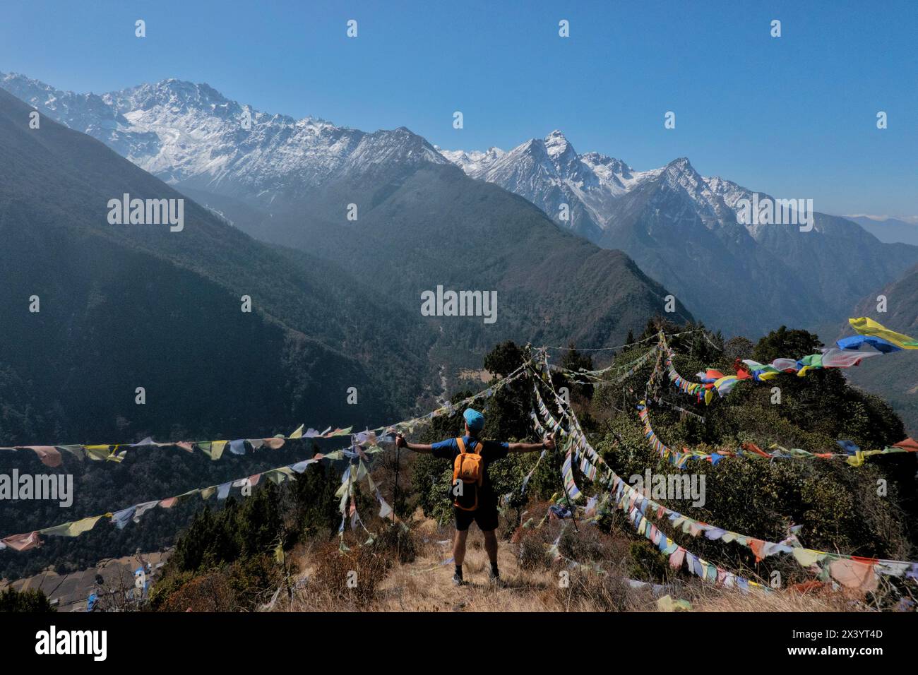 Prayer flags above the Tibetan village of Ghunsa on the Kangchenjunga ...