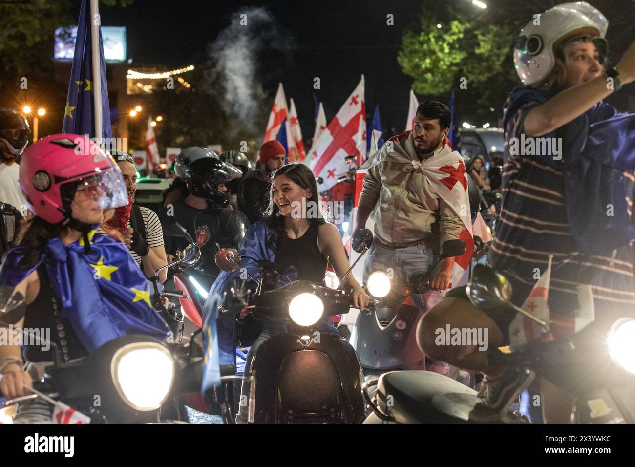 A protester on a motorcycle takes part in a protest against the ...