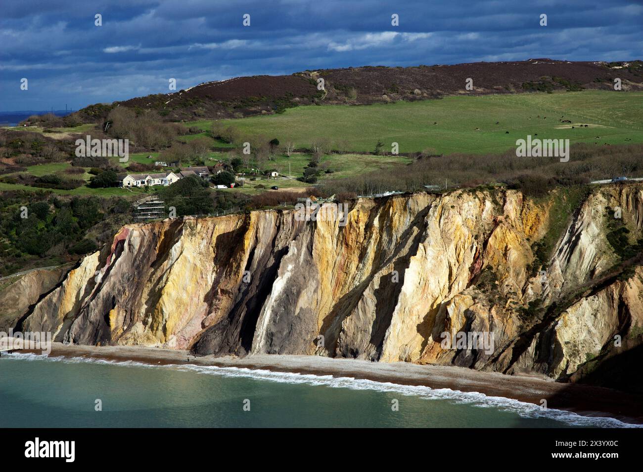 The multi-coloured sand cliffs of Alum Bay are a geological curiosity ...