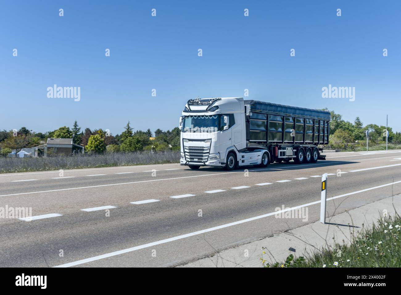 White tractor trailer truck driving highway hi-res stock photography ...