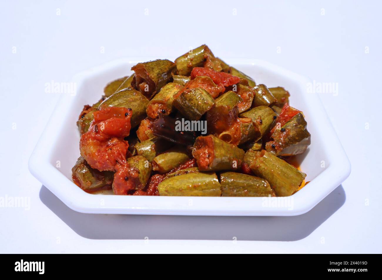 Pointed gourd curry or Parwal ki sabzi served in plate with white ...