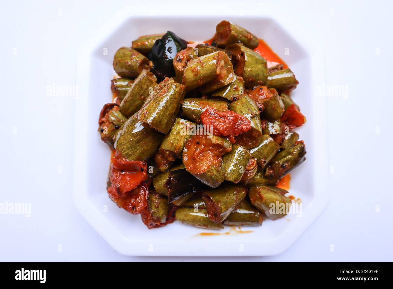 Pointed gourd curry or Parwal ki sabzi served in plate with white ...