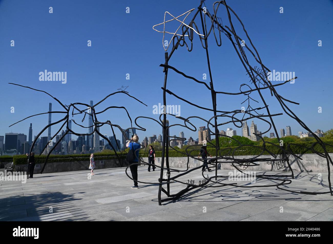 Guests tour the art installations on display at the press preview for ...