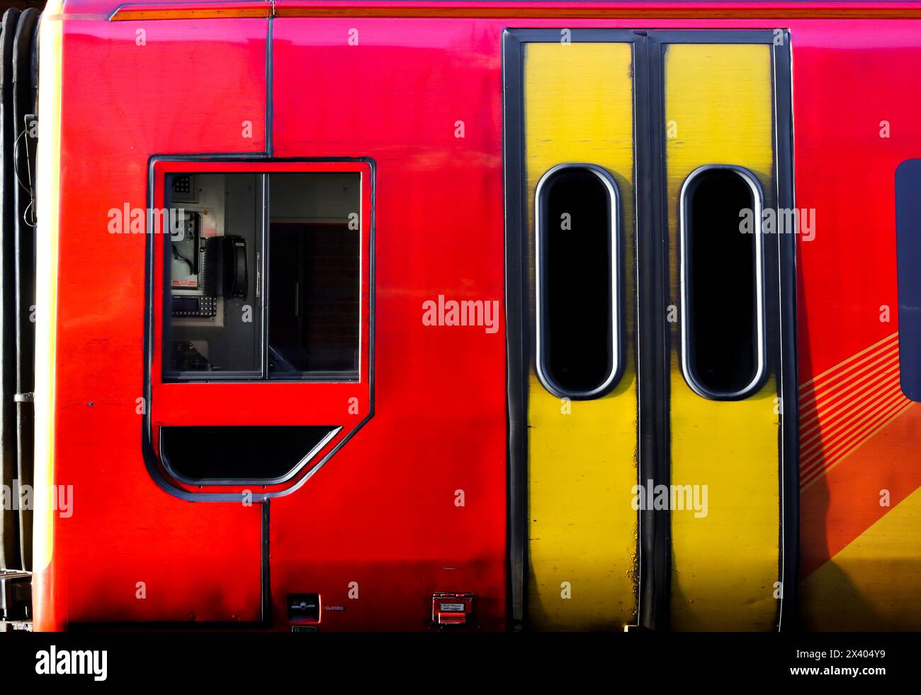 Salisbury, England- March 30, 2024: Colorful red and yellow train at ...