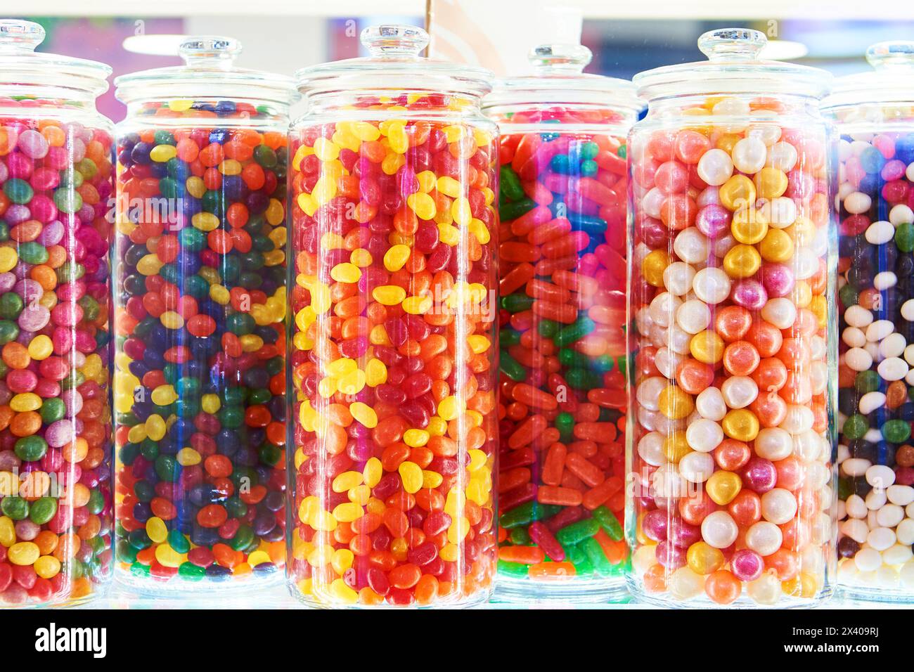 Dragee sweets in icing on the store shelf Stock Photo - Alamy