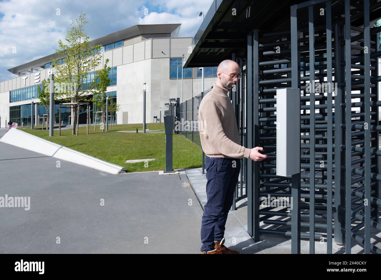 man passes through checkpoint Tesla Gigafactory Berlin-Brandenburg ...