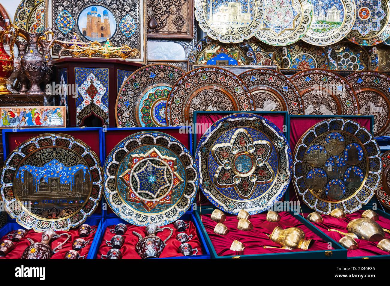 traditional Uzbek handmade metal and wooden plates hand-painted in a ...