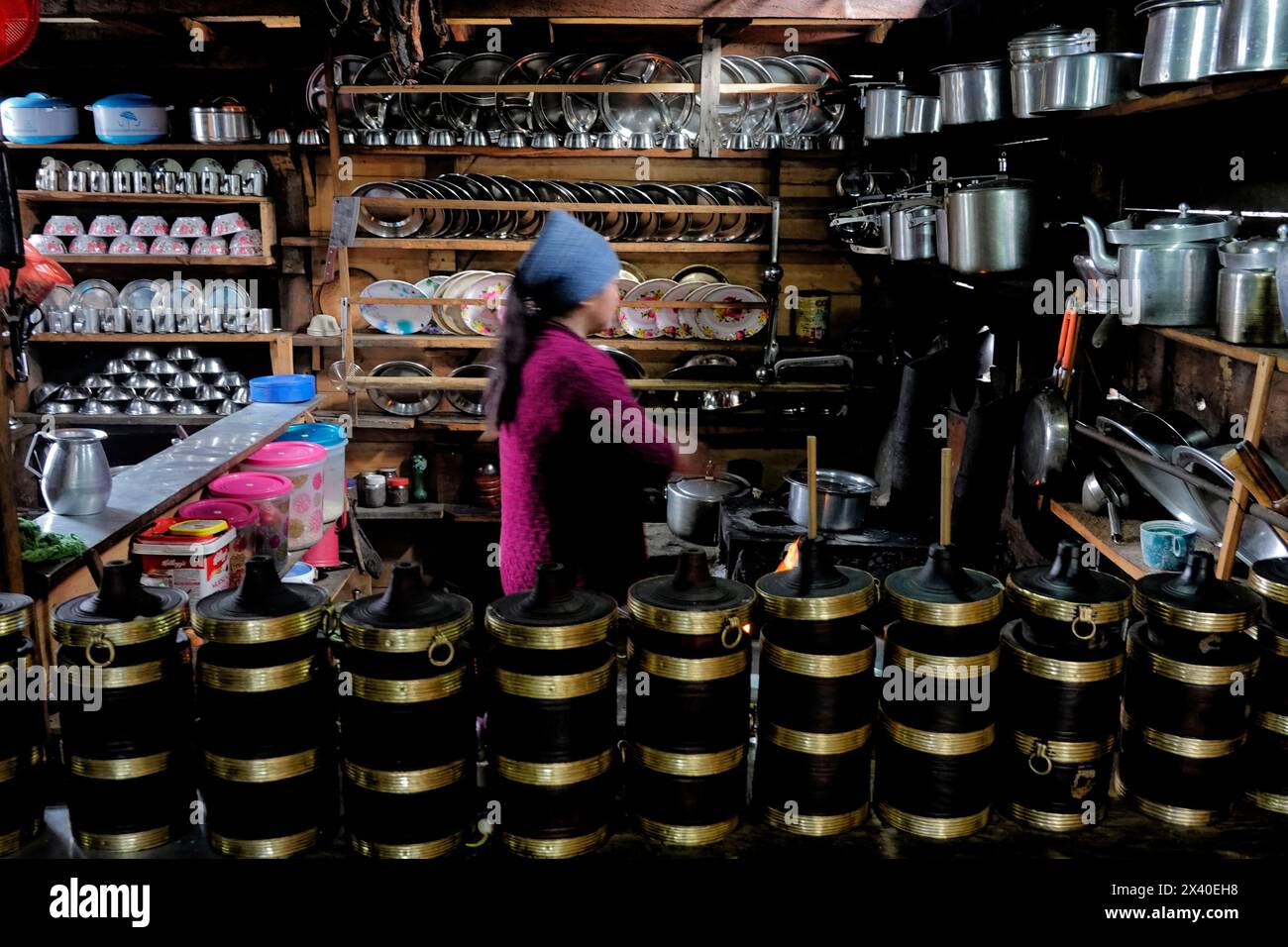 Traditional teahouse kitchen with tongba millet alcohol vessels on the ...