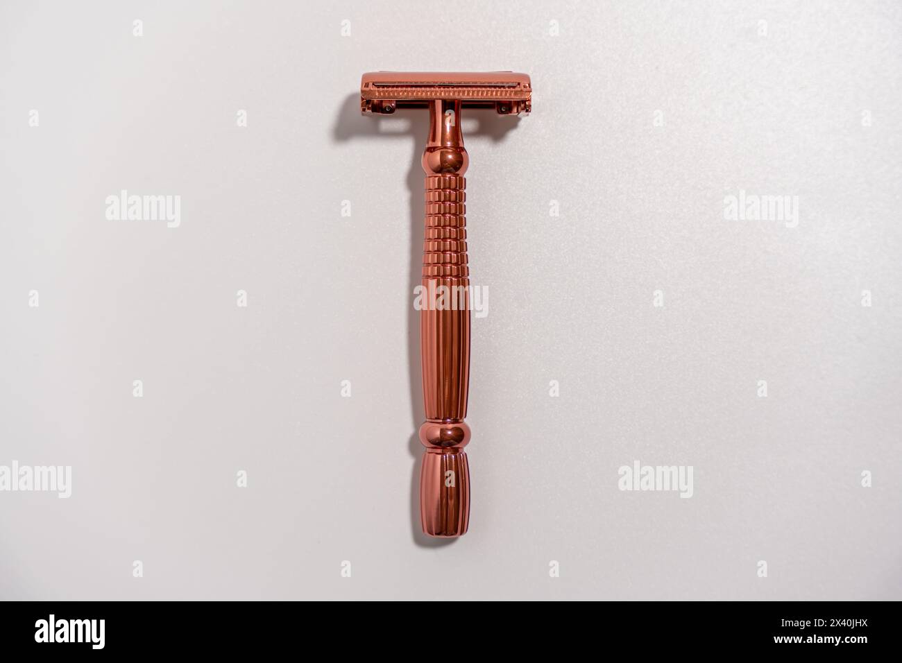 Metal razor on a white background. Razor close-up Stock Photo - Alamy
