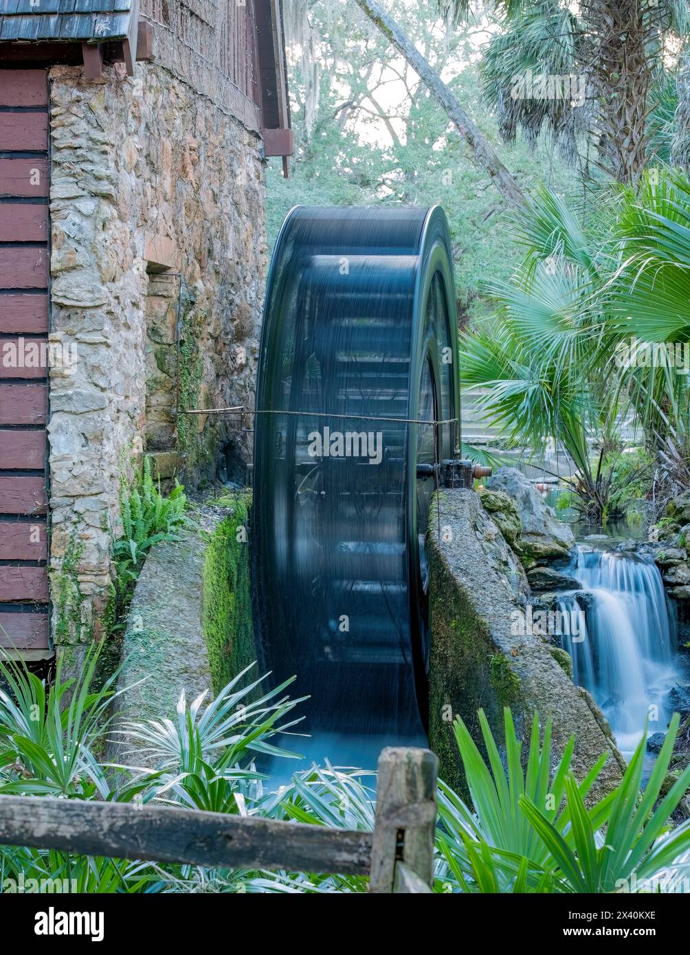 Small waterfall beside water wheel at a watermill; Juniper Springs ...