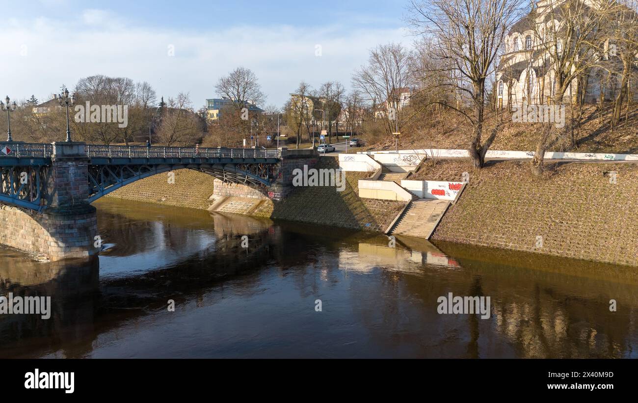 Drone photography of flooded riverside bank in a city during spring ...