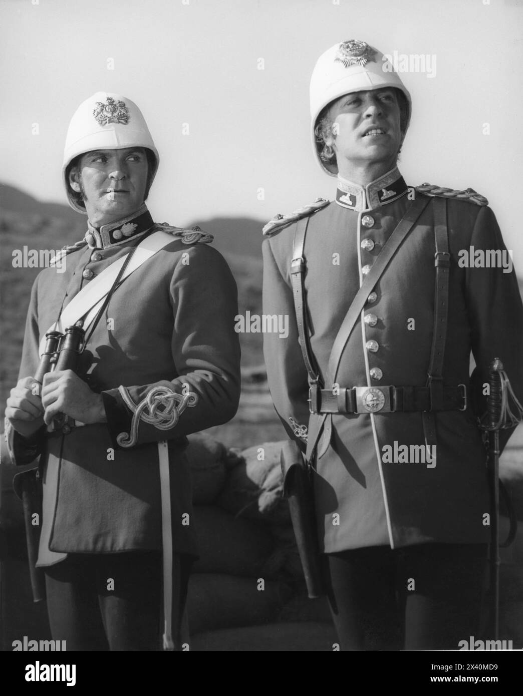 STANLEY BAKER and MICHAEL CAINE in a scene from ZULU 1964 Director CY ...