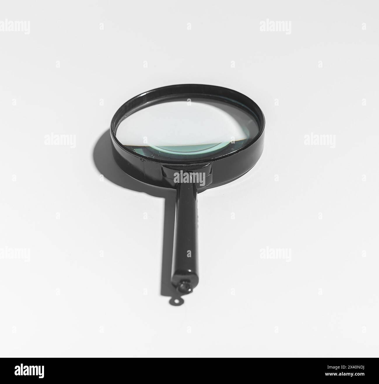 Office analysis with magnifying glass, zooming in on details. Quality ...