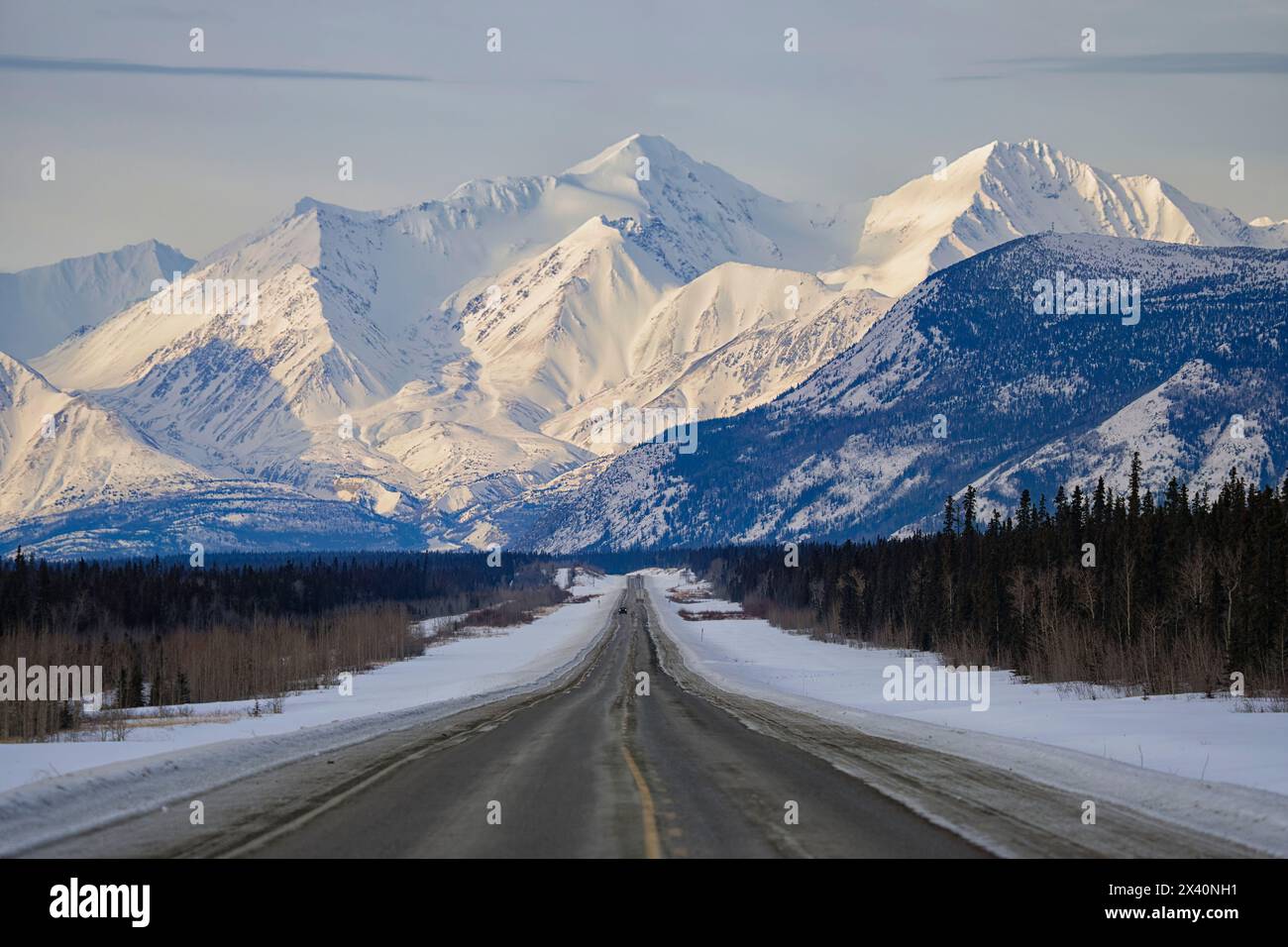 Alaska Highway reaches into the distance as the Saint Elias mountains ...