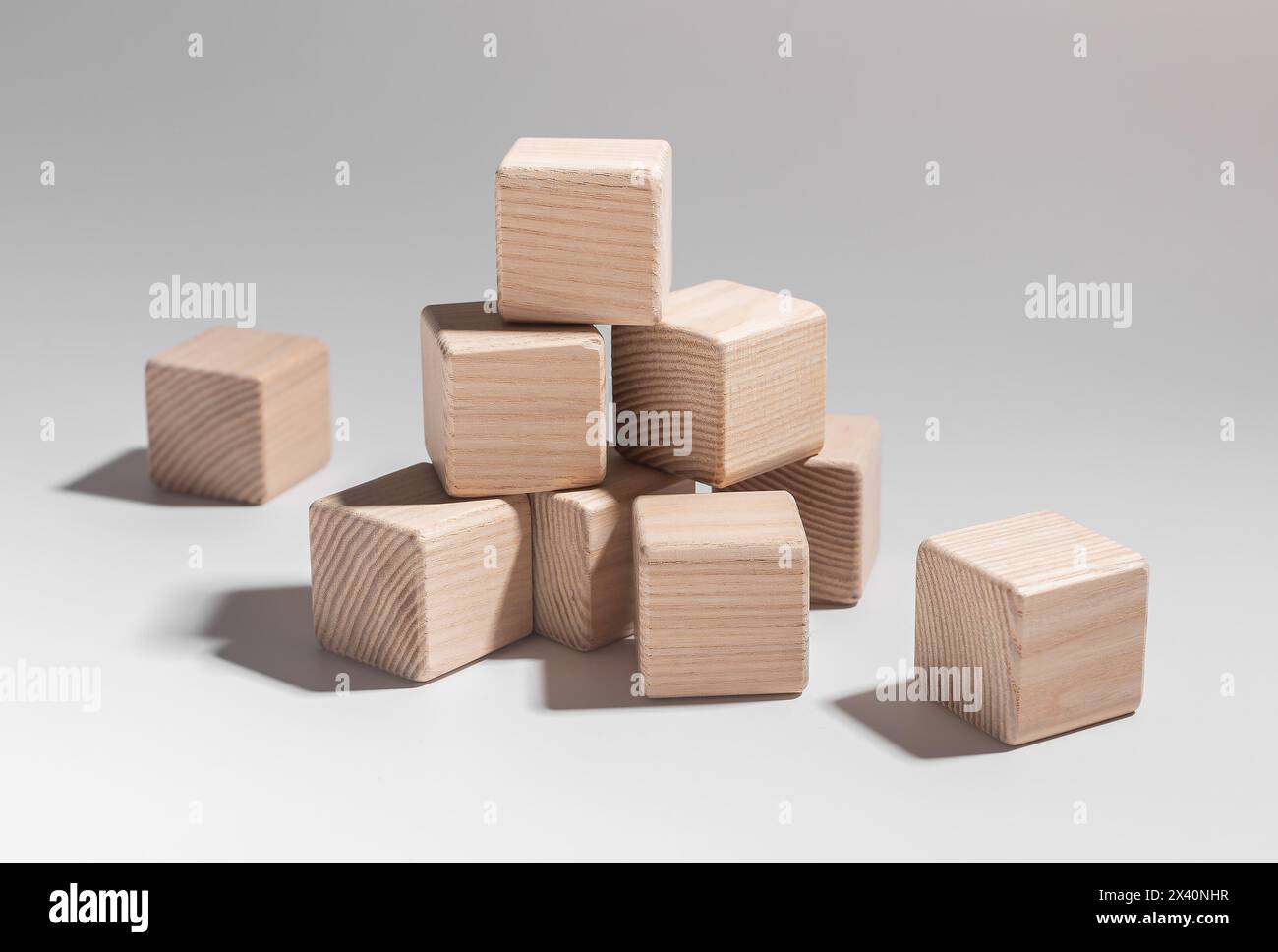 Wooden blocks stacked in educational play. Business and economy ...