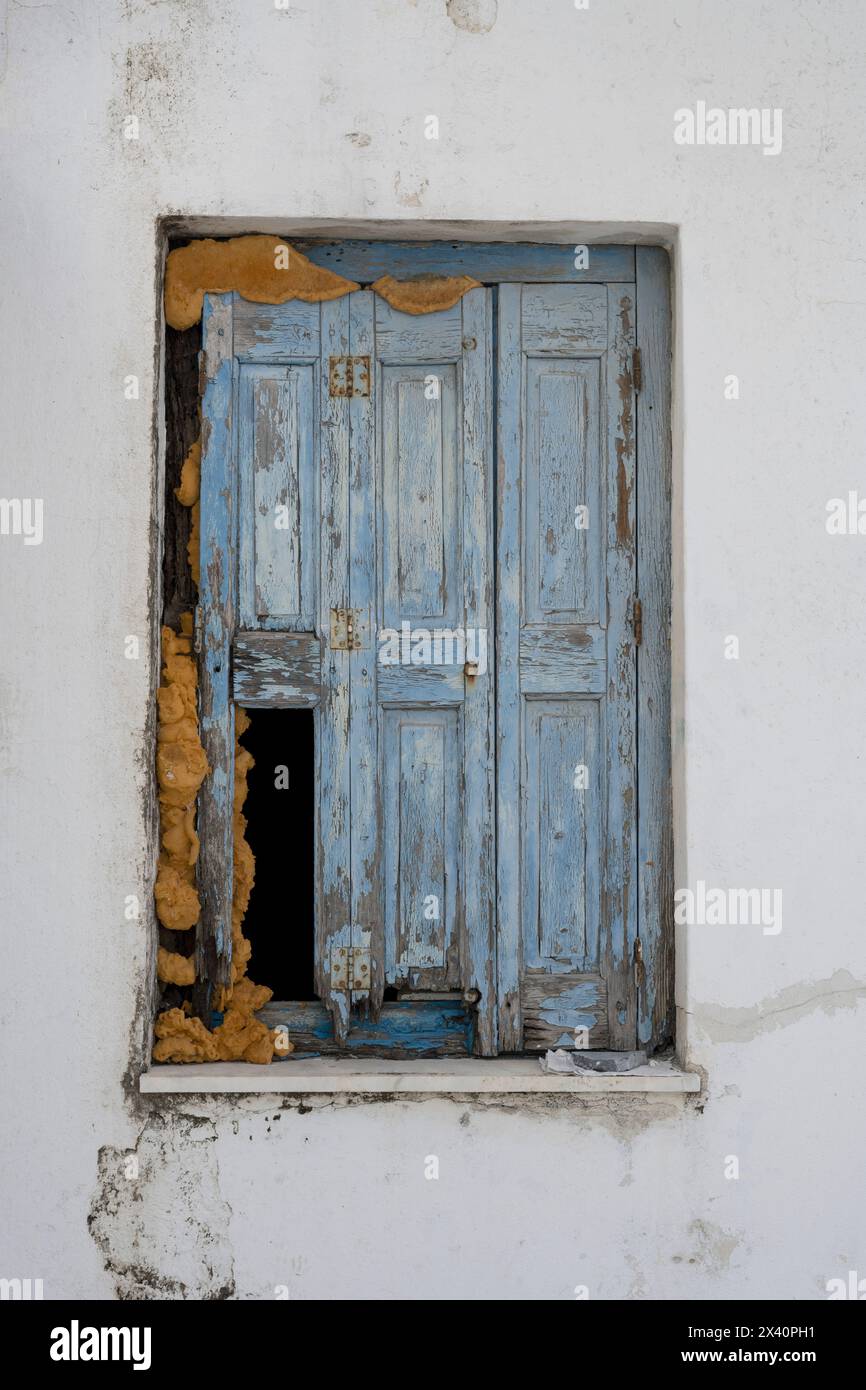 Weathered and worn window shutter; Mykonos, Greece Stock Photo - Alamy