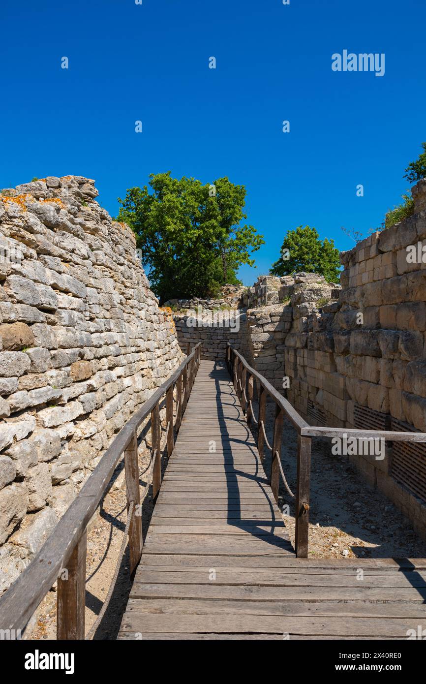 Ruins of Troy ancient city with wooden walkway. ancient city ruins in ...