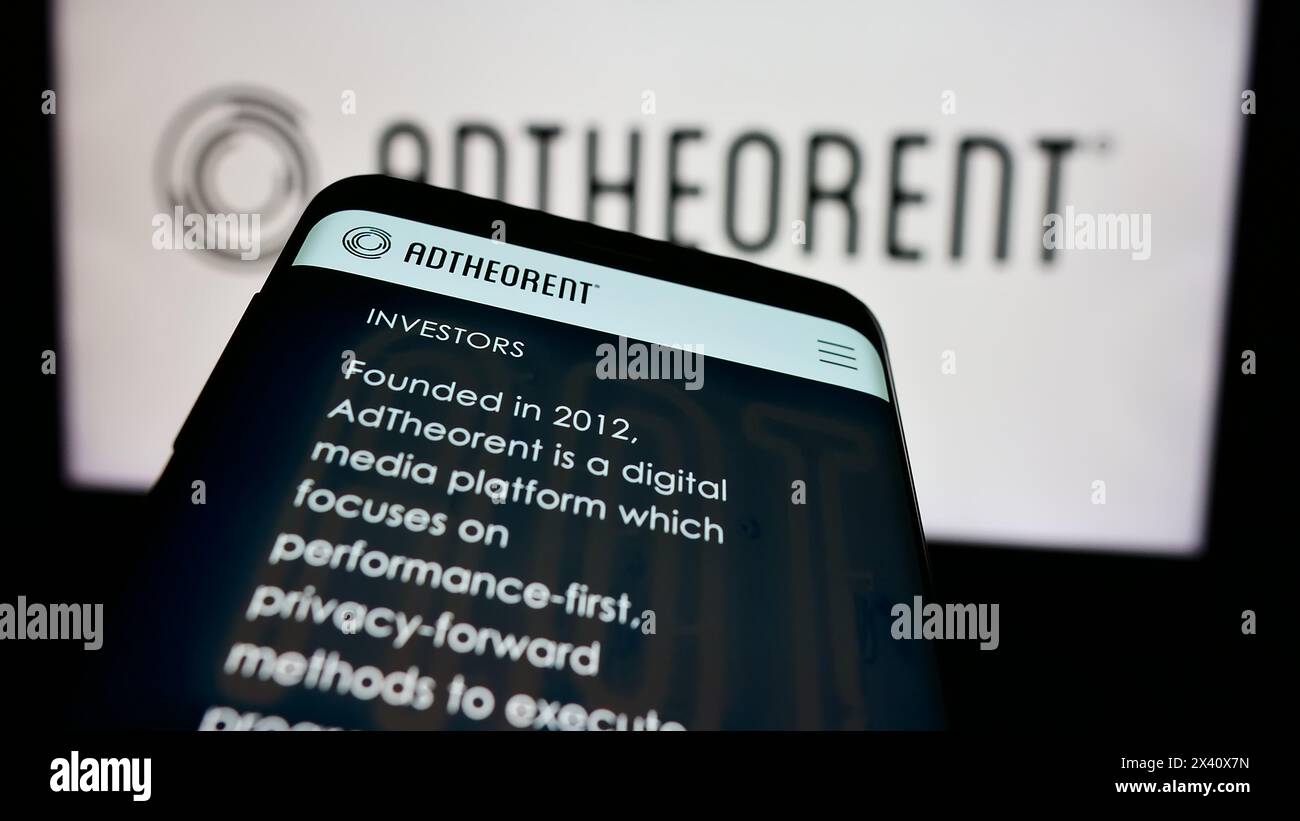 Mobile phone with webpage of US advertising software company AdTheorent ...