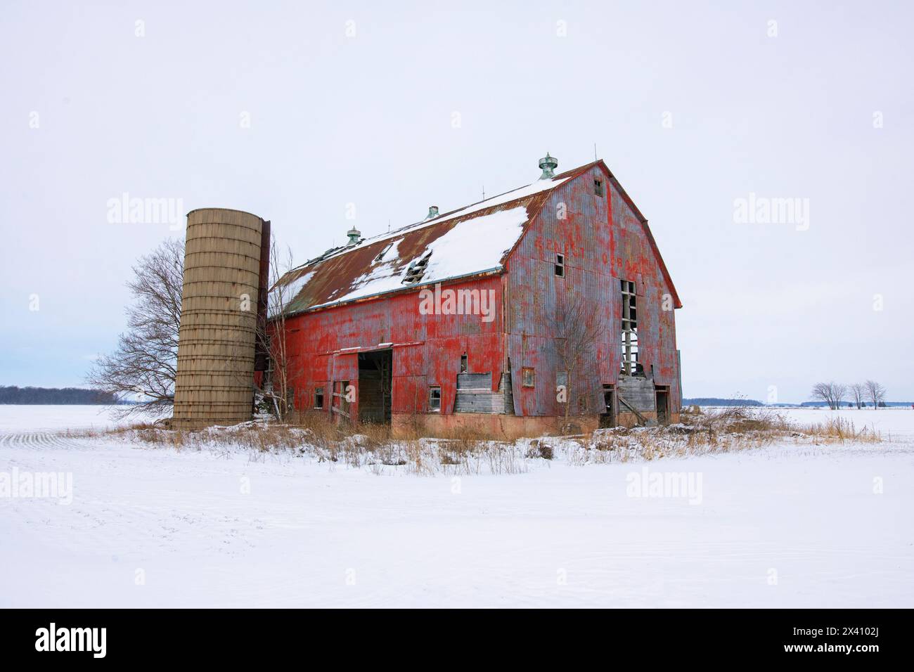 Abandoned red barn in rural Ontario, seen here in the winter; Strathroy ...