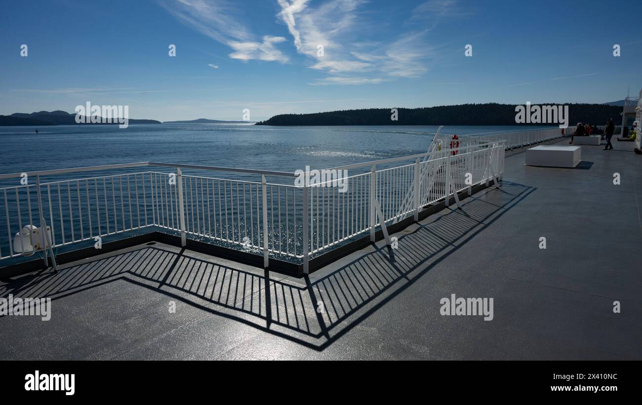 Coastline of islands and blue water of the Strait of Georgia viewed ...