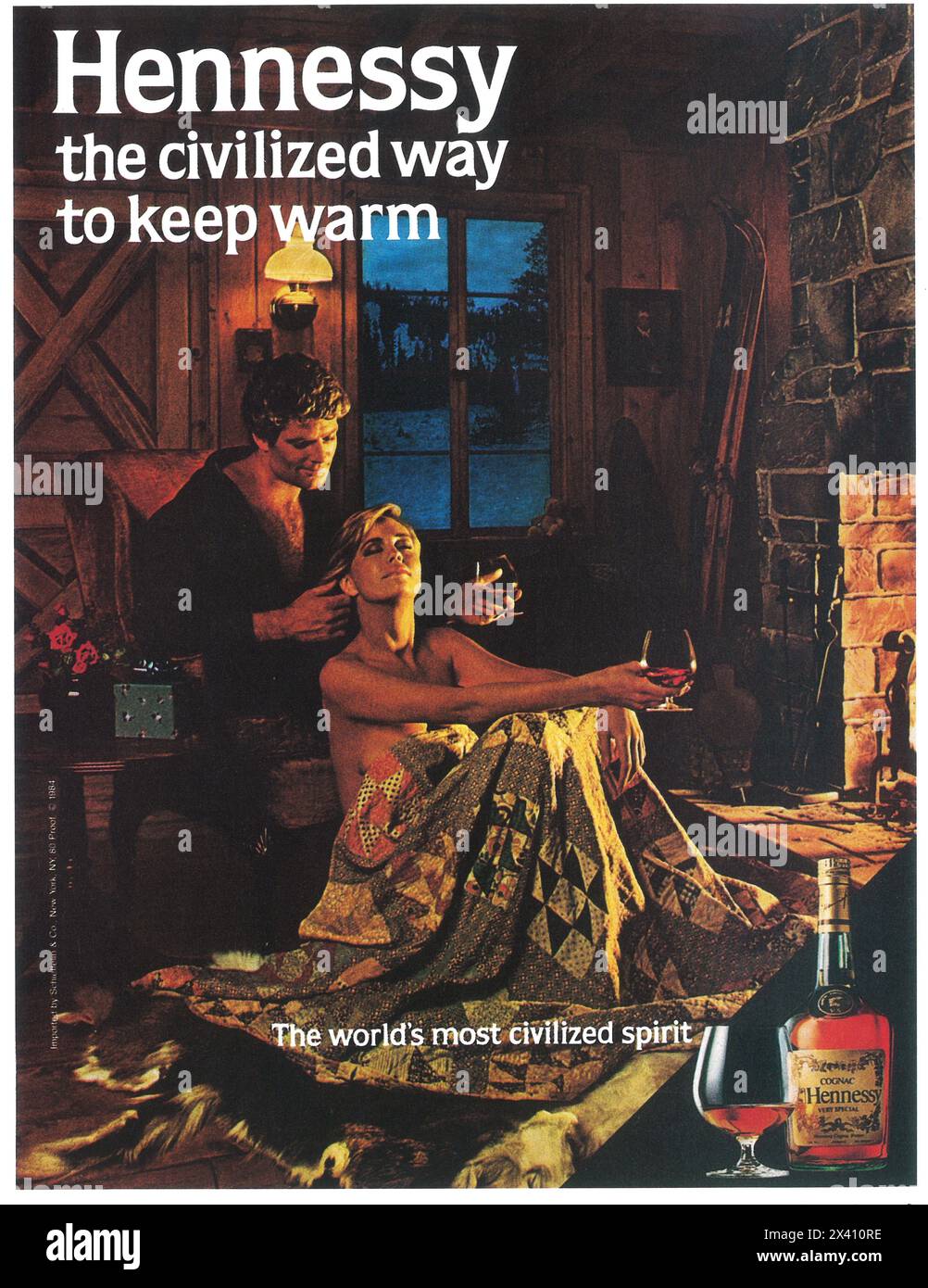 1985 Hennessy Ad - The civilized way to keep warm Stock Photo - Alamy