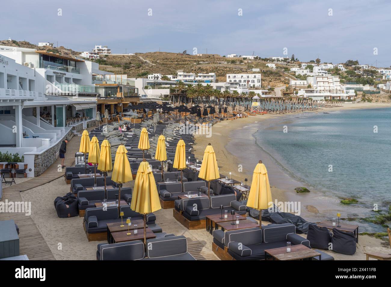 Picturesque scene of waterfront restaurants on the island of Mykonos ...