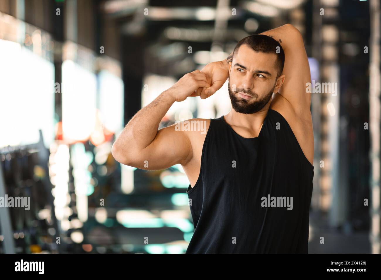 Fit Man Performing Triceps Stretch in Gym During Morning Workout Stock ...