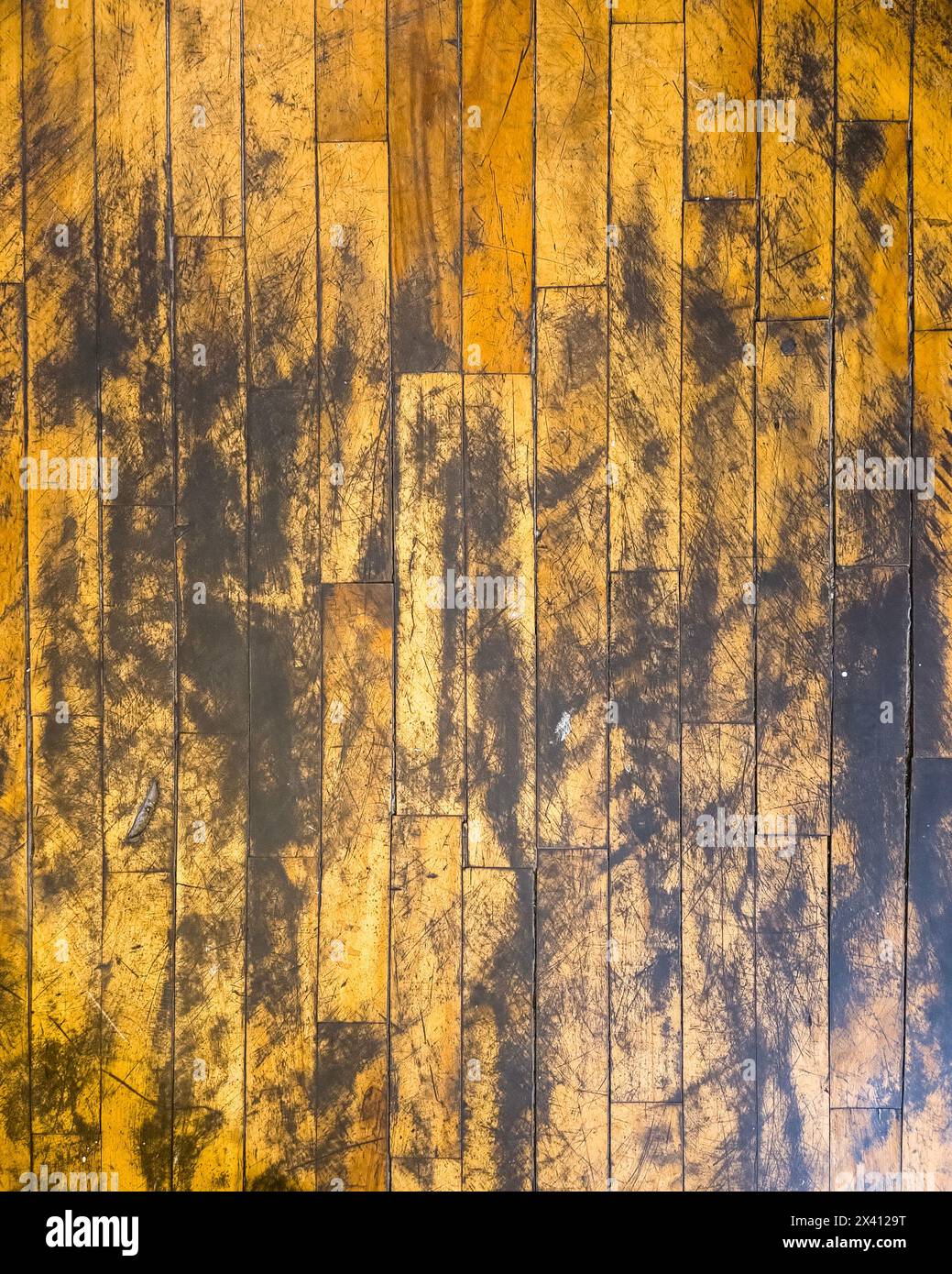 Antique worn hardwood floor with black scuff marks Stock Photo - Alamy
