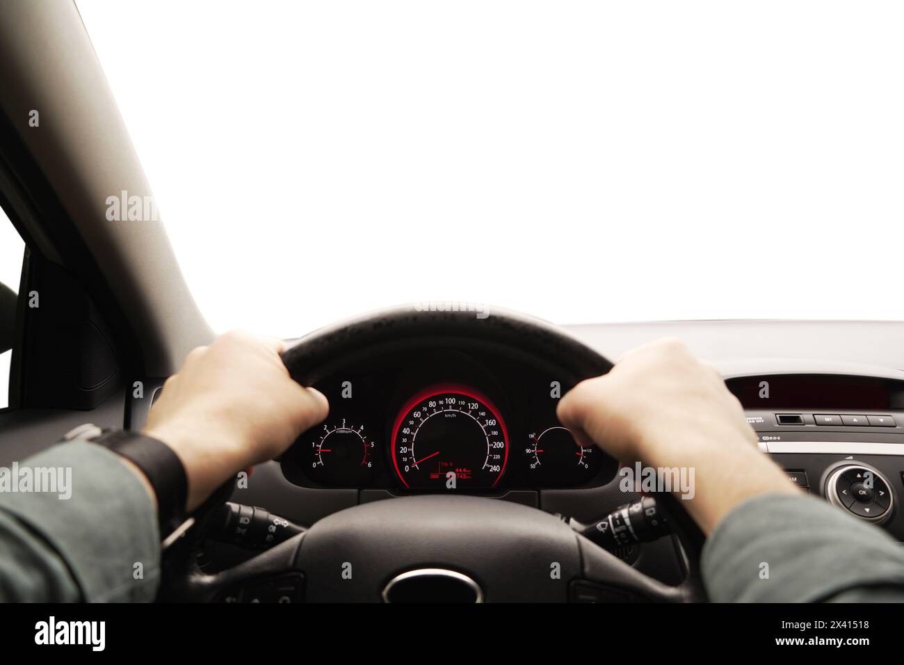 Man driving car with speedometer on dashboard, closeup Stock Photo - Alamy