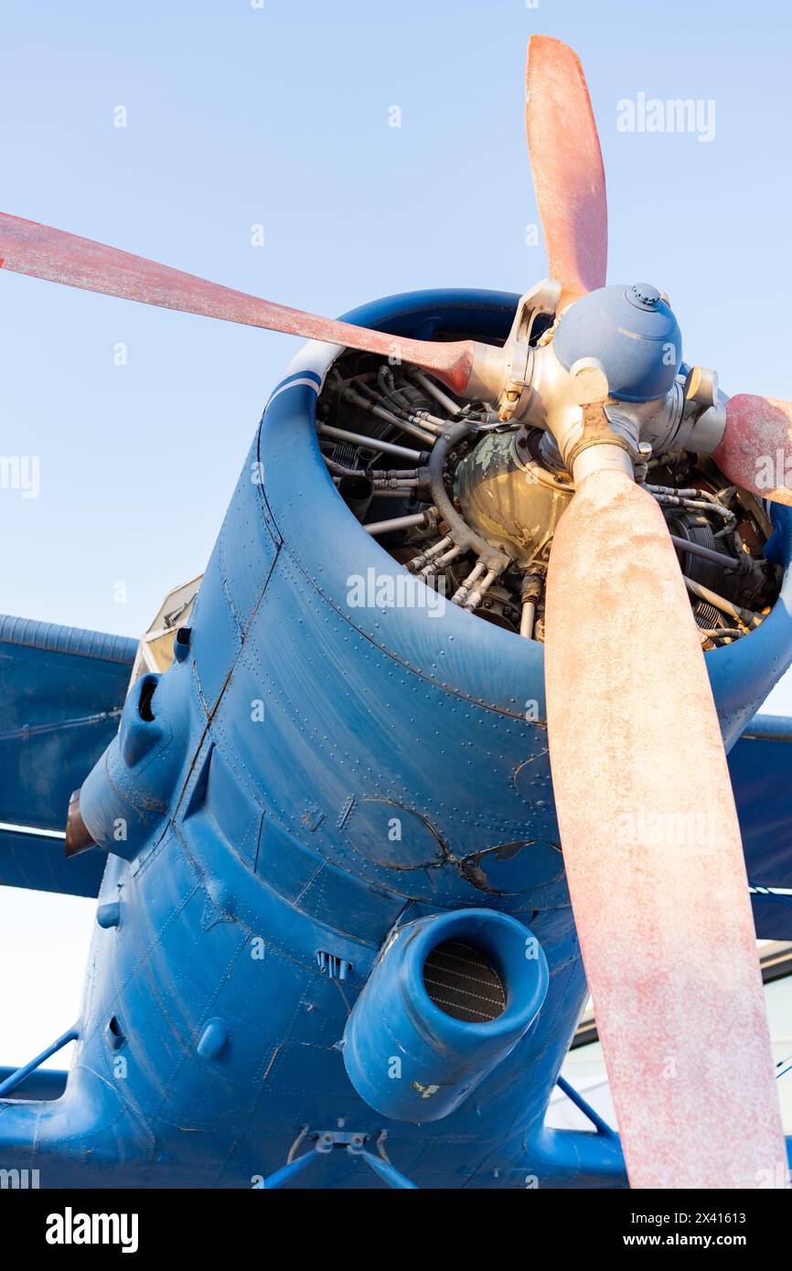 Plane with propeller on beautiful bright sky background. Engine of an ...