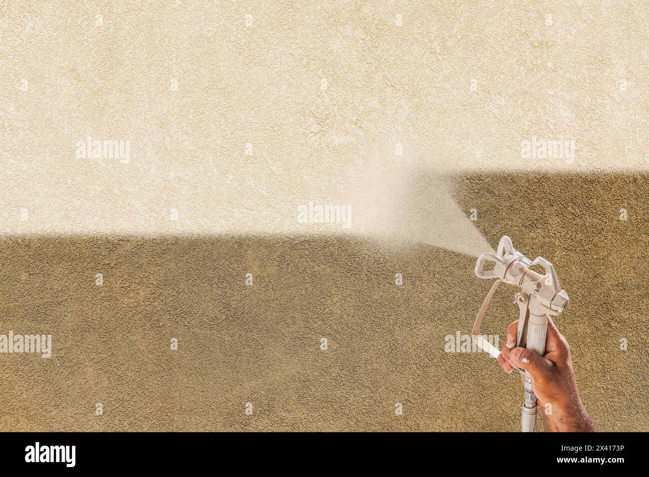Professional Spray Painter Holding Spray Gun Spraying White Paint Over ...