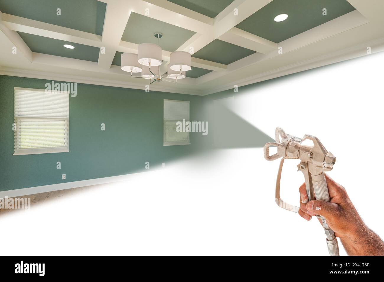 Professional Spray Painter Holding Spray Gun Spraying Renovated Room ...