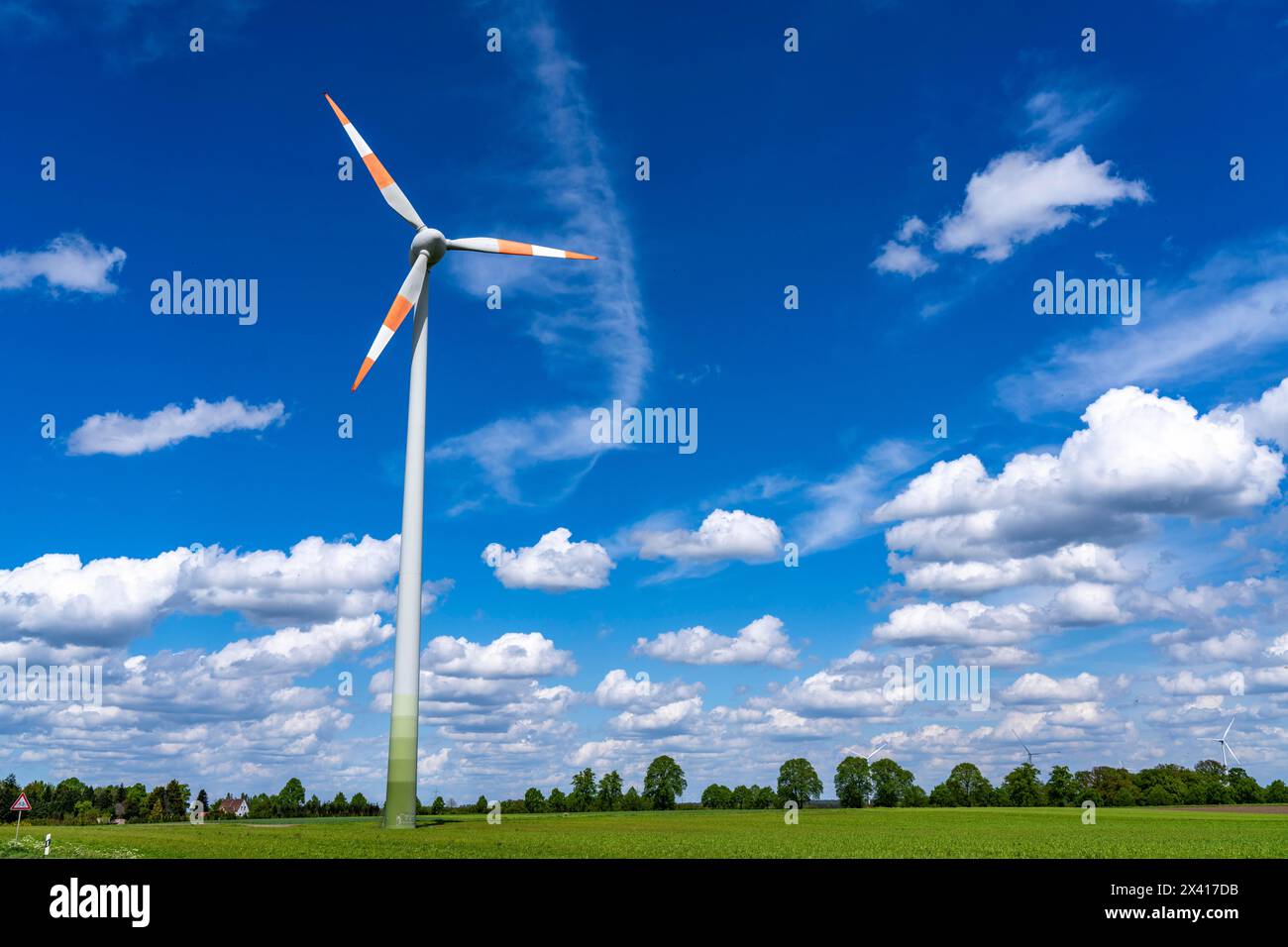 Wind turbine, wind energy plant from the manufacturer Enercon, blue sky ...