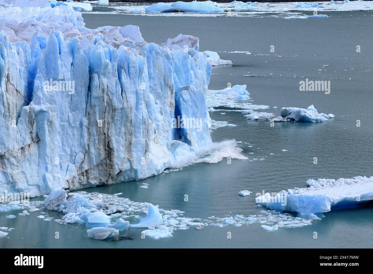 The scenic view of Perito Moreno Glacier's big piece of ice falling ...