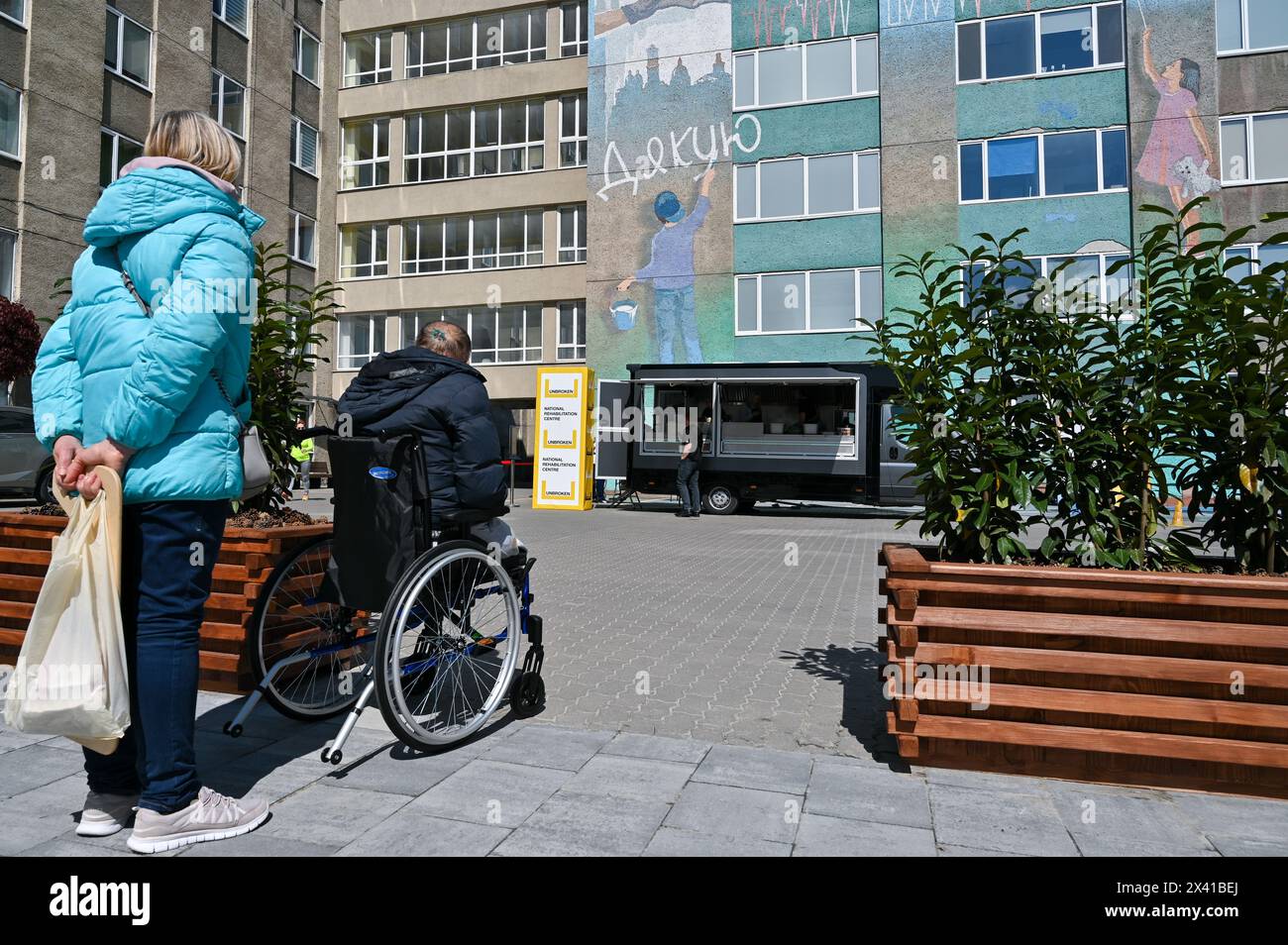 Non Exclusive: LVIV, UKRAINE - APRIL 26, 2024 - A woman and a man in a ...