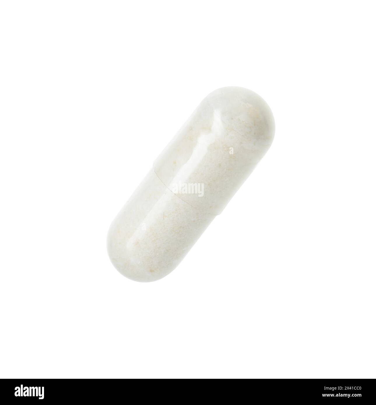 One vitamin capsule isolated on white. Health supplement Stock Photo ...