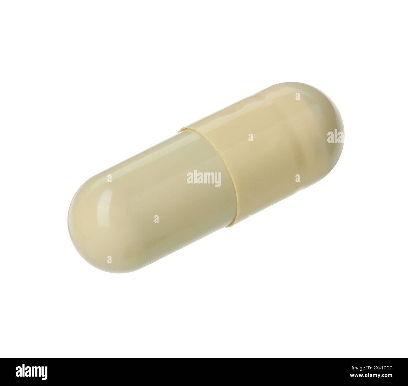 One vitamin capsule isolated on white. Health supplement Stock Photo ...