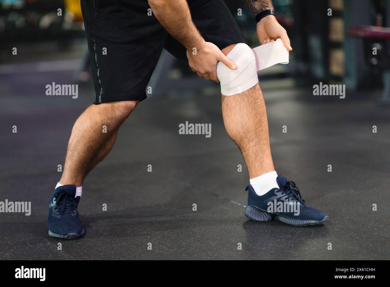 Man bandage around leg hi-res stock photography and images - Alamy