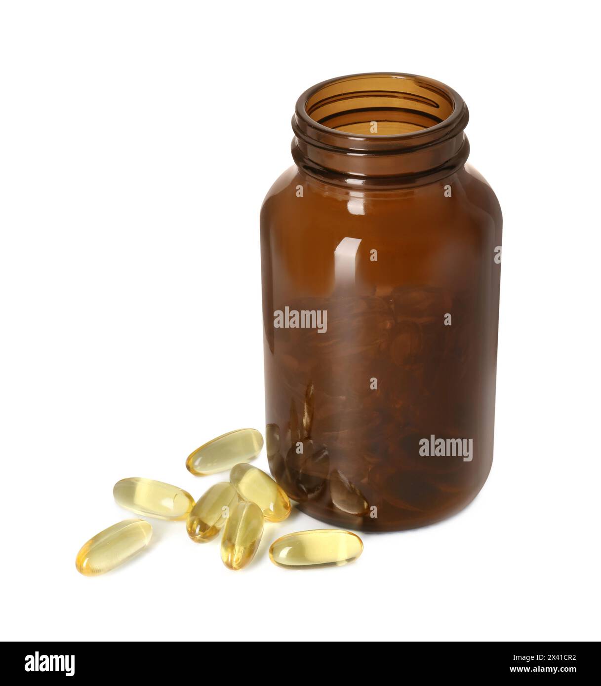 Bottle and pile of softgel capsules isolated on white Stock Photo - Alamy