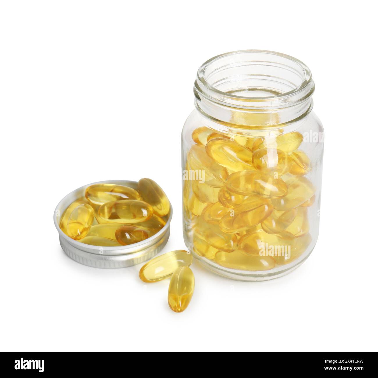 Bottle and pile of softgel capsules isolated on white Stock Photo - Alamy