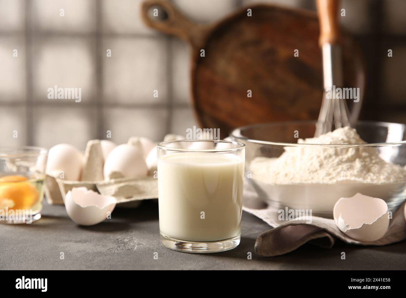 Different ingredients for dough on grey table, closeup Stock Photo - Alamy