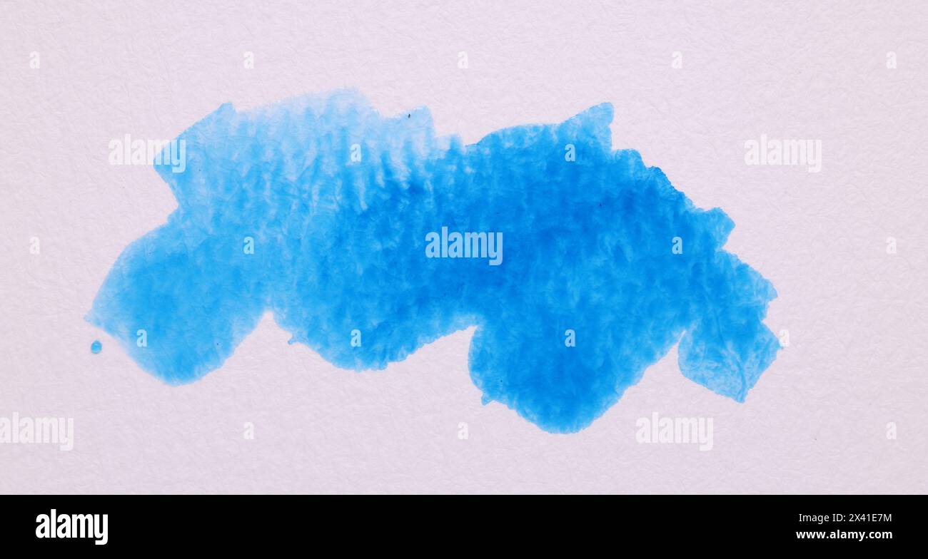 Blot of blue watercolor paint on white paper, top view Stock Photo - Alamy