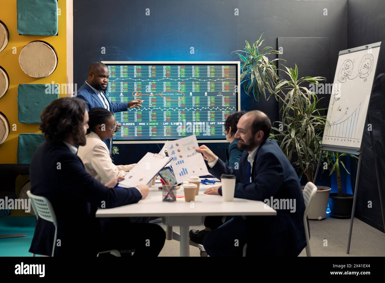 Team of business employees study feedback on old initiatives to improve ...