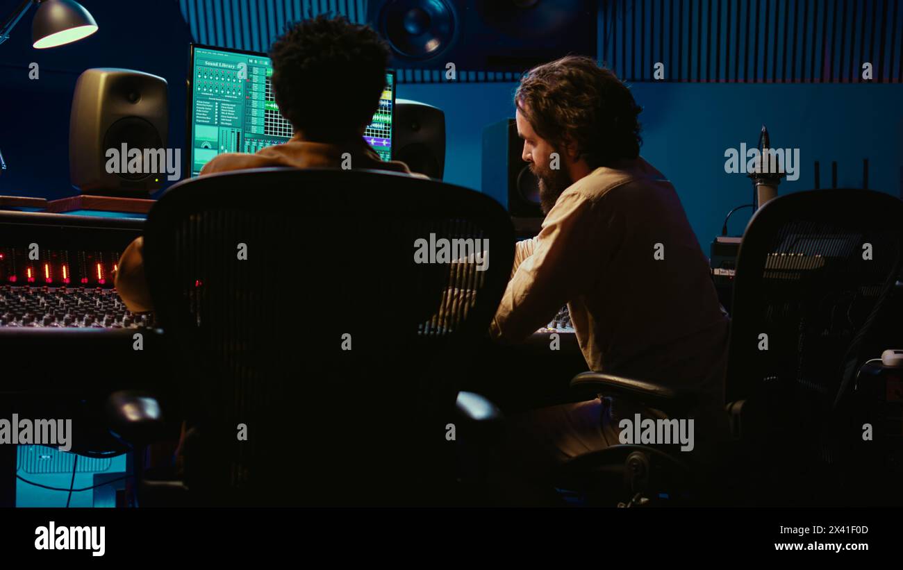 Audio Expert And Musician Mixing And Mastering Tracks On Control Room